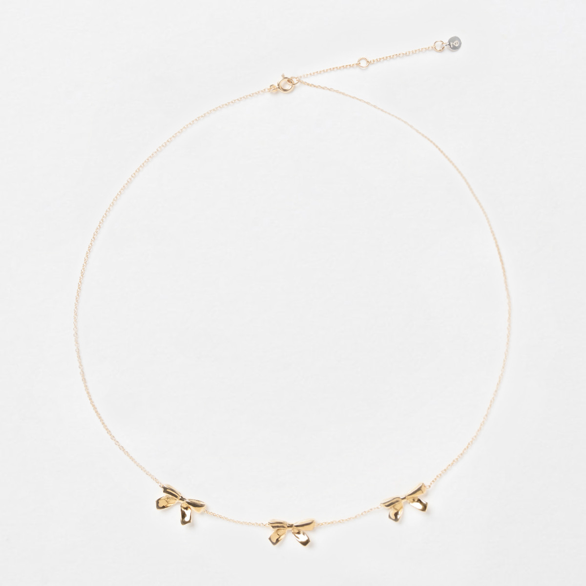 Suzette N. - Necklace with three ribbon charm details. Adjustable ...